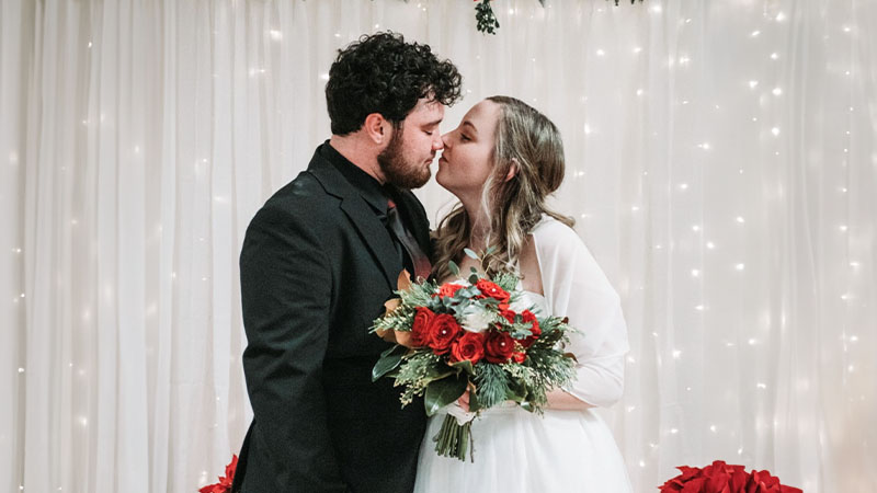 Aaron and Kayla at their wedding